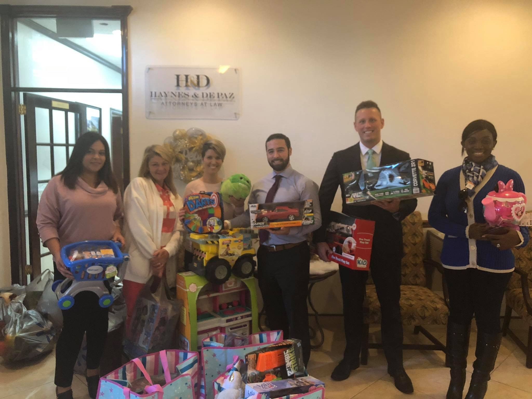 Haynes Law Group Donates to OrphanCared